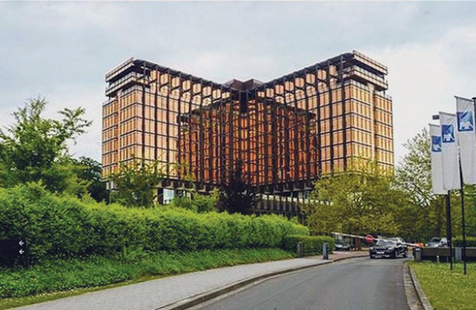 AXA-gebouw en bijhorend park erkend als erfgoed | BRUZZ